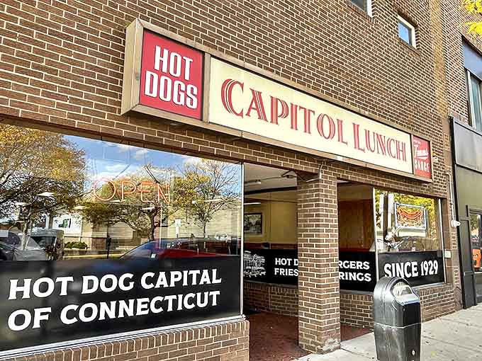 The iconic red and green Capitol Lunch sign has been beckoning hungry New Britain residents since 1929. That neon hot dog isn't just decoration—it's a beacon of hope.