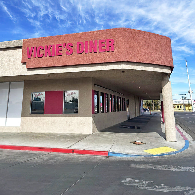 The classic Vegas exterior might not scream "architectural marvel," but that pink awning whispers "come in, the pancakes are waiting."