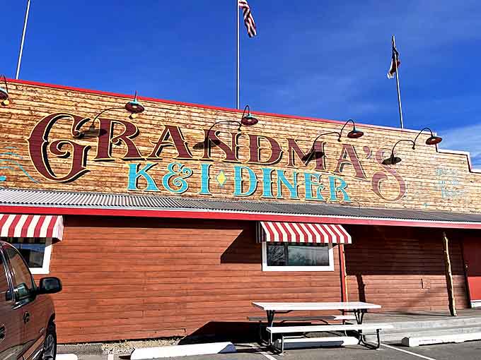 The brick facade and bold signage of Grandma's K & I Diner stands like a beacon of breakfast hope against Albuquerque's brilliant blue sky.