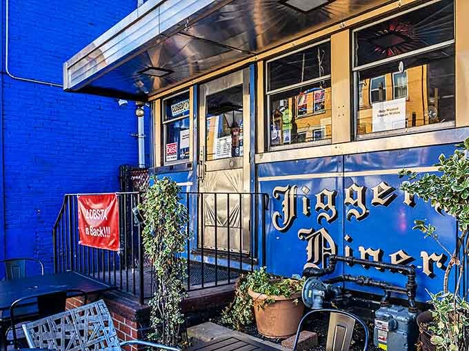 The blue exterior of Jigger's Diner beckons like a time machine to simpler days, when breakfast was an event and "booth service" meant something special.
