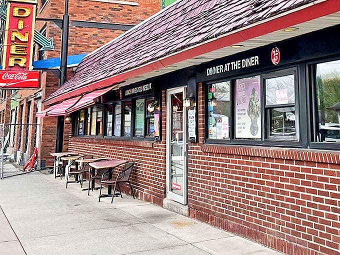 That iconic vertical sign isn't just advertising &ndash; it's a beacon of hope for the hungry, promising "finest foods" and delivering on that promise since day one.