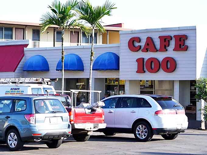 Palm trees frame this unassuming culinary landmark, where hungry locals have been getting their gravy fix for generations.