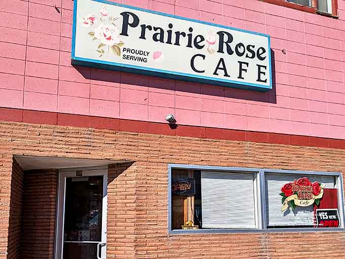 The iconic pink exterior of Prairie Rose Cafe stands out in Laramie like a delicious beacon of breakfast hope in a sea of beige buildings.