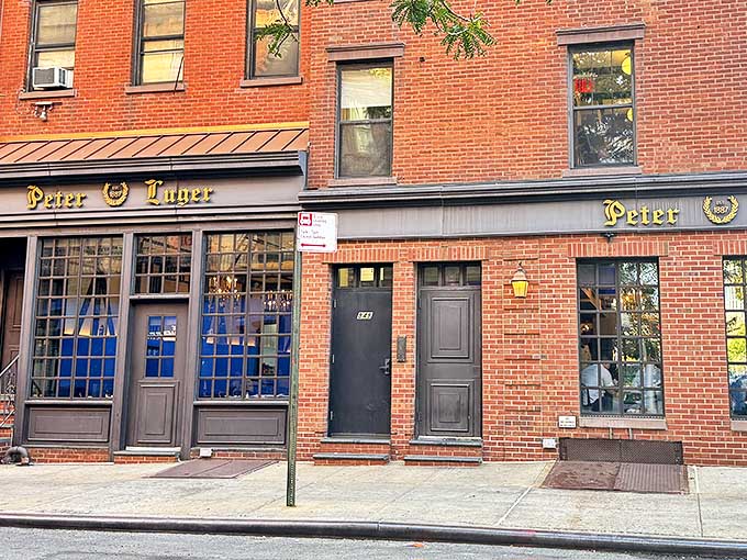 The iconic gold lettering against brick announces Peter Luger like a culinary bat signal to steak lovers across New York. Simplicity that speaks volumes.