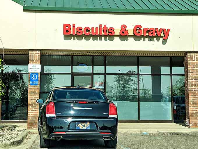 The red lettering against beige brick isn't trying to impress anyone&mdash;it's saving all that energy for what's happening in the kitchen.