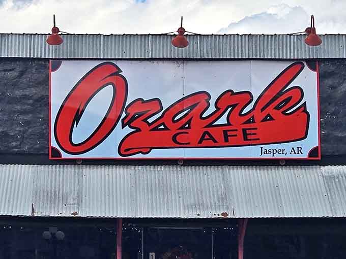 That bold red script against the weathered facade isn't just a sign&mdash;it's a beacon of hope for empty stomachs traveling through the Ozarks.