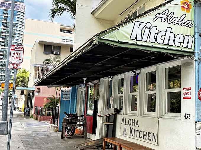 Aloha Kitchen's unassuming exterior hides Honolulu's best-kept breakfast secret, where locals line up for delicious Eggs Benedict.