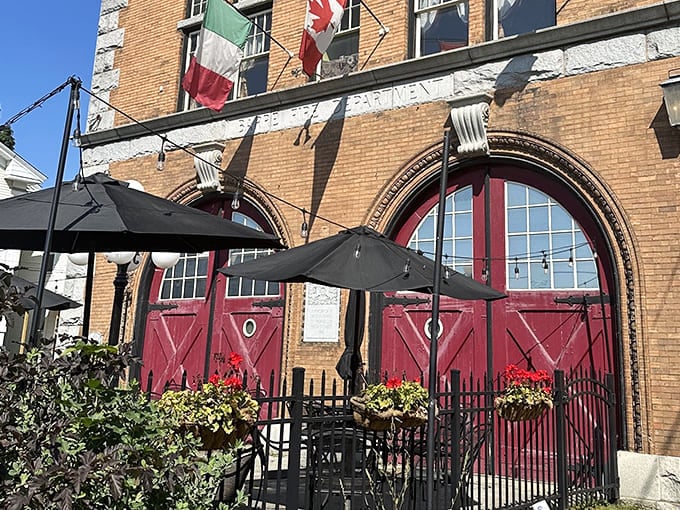Outdoor dining beneath those magnificent arched doorways feels like eating in a living museum of Vermont history.