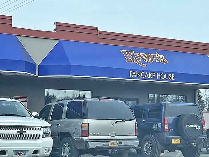 That iconic blue awning with golden lettering &ndash; like a breakfast lighthouse guiding hungry souls through the Alaskan morning fog.