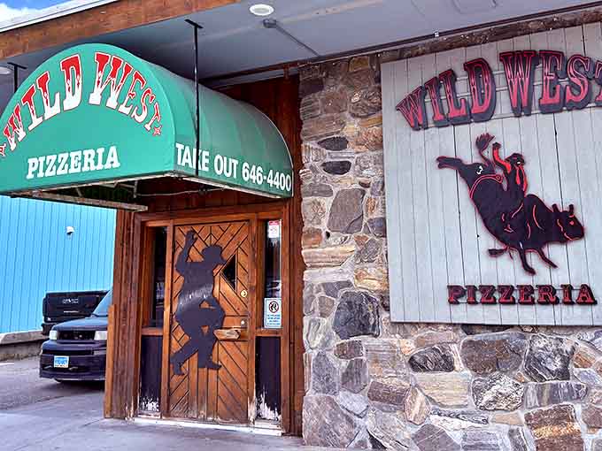 That iconic green awning has welcomed hungry travelers for years, like a beacon of pizza salvation at Yellowstone's doorstep.