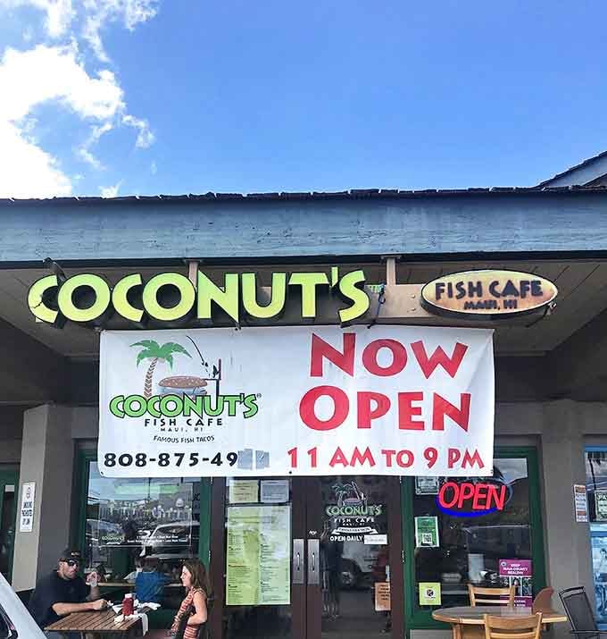 The unassuming facade of Coconut's Fish Cafe welcomes hungry visitors with a promise of "Famous Fish Tacos" and island-time hours that stretch from late morning to evening.