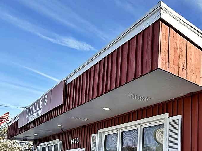 The unassuming red exterior of Lucille's might not scream "culinary destination," but locals know this humble facade hides breakfast treasures worth the drive.
