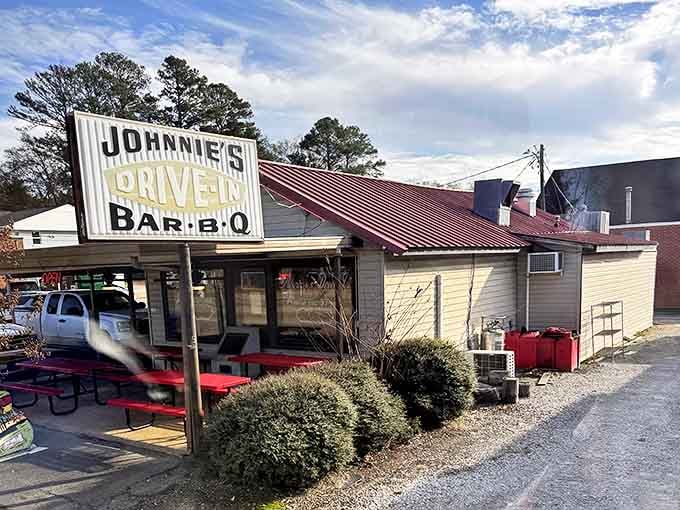 The weathered metal roof and humble facade of Johnnie's Drive In tell you everything you need to know&mdash;this place doesn't need fancy frills when the food speaks volumes.