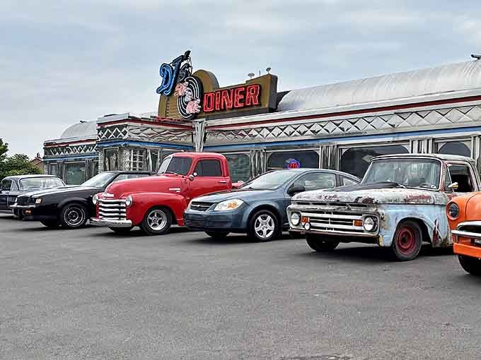 Classic cars and modern vehicles share the parking lot at DJ's, where automotive history meets breakfast perfection in Fairmont.