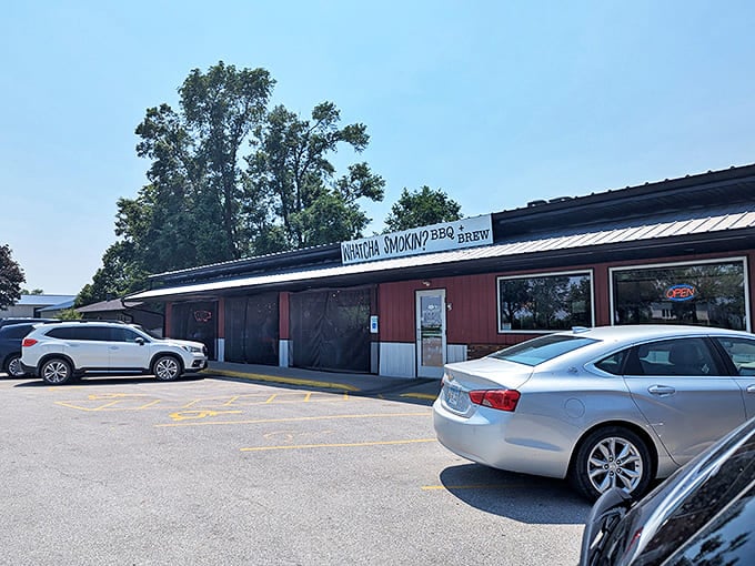 Cars from near and far fill the parking lot, drawn by the siren song of perfectly smoked meats and affordable prices.