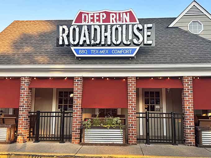The welcoming storefront of Deep Run Roadhouse proudly announces its triple threat of BBQ, Tex-Mex, and comfort food delights.