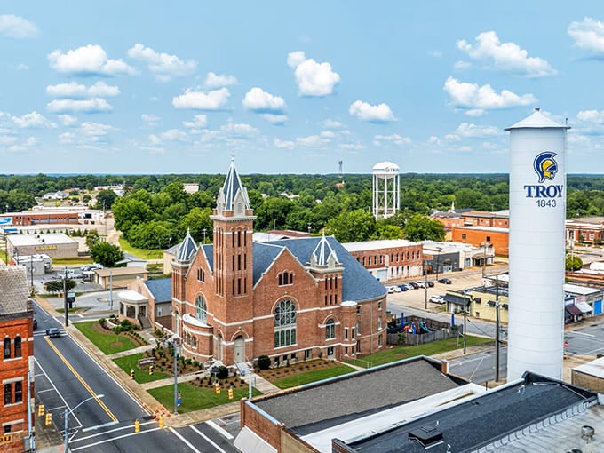Tree-lined streets and well-kept lawns tell the story of Troy, where neighbors still wave and front porches aren't just for show.