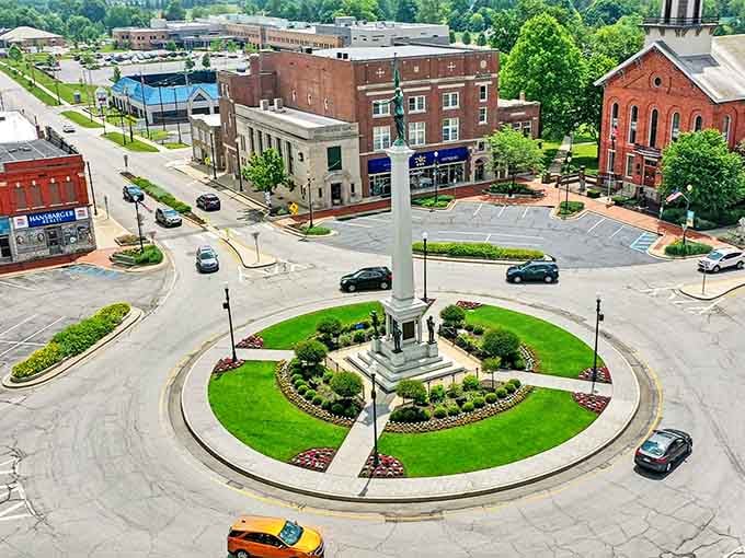 Angola's iconic Civil War monument stands proudly at the center of town, where brick buildings and small-town charm create a postcard-perfect downtown scene.