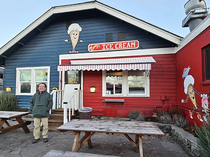 A blue awning and string lights create the perfect outdoor dining atmosphere. Eugene's weather occasionally cooperates just to be nice.
