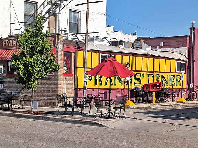 The bright yellow railcar exterior of Frank's Diner stands out like a beacon of breakfast hope on Kenosha's streetscape.