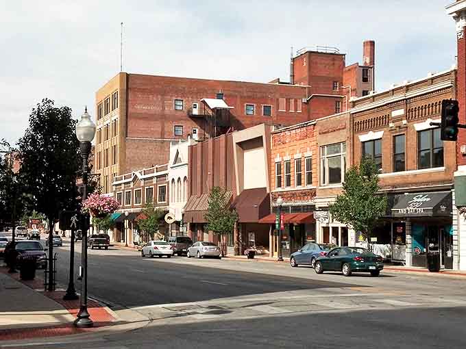 Tree-lined streets and classic brick buildings create that perfect small-town atmosphere where shopkeepers still remember your name.