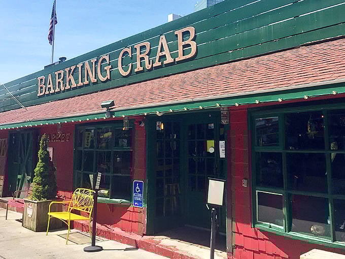 Sunshine bounces off the green-trimmed facade, announcing "BARKING CRAB" in letters as bold as the flavors waiting inside.