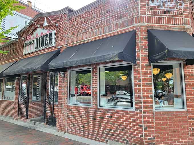 The black awnings and brick exterior give Mike's that quintessential Boston character&mdash;sturdy, unpretentious, and ready to serve regardless of weather or whim.
