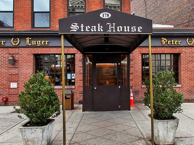The iconic gold lettering against brick announces Peter Luger like a culinary bat signal to steak lovers across New York. Simplicity that speaks volumes.