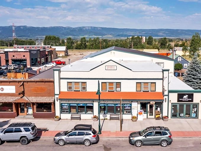 Historic buildings line Driggs' Main Street, with mountain ranges creating a stunning backdrop to this authentic Idaho town.