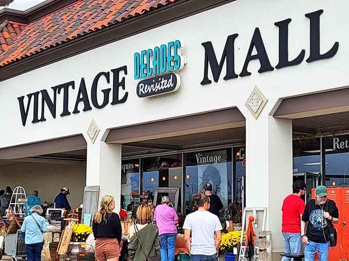 The storefront beckons like a time portal, with eager treasure hunters already gathering outside. Every visit promises new discoveries!
