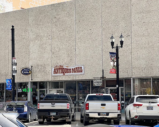 The unassuming exterior of St. Joe Antiques Mall belies the wonderland within, like finding a portal to the past behind a modest storefront.