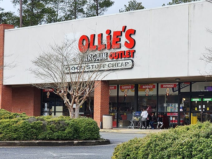 The iconic red Ollie's sign stands out like a beacon of bargains, promising treasure hunters the thrill of the unexpected behind those doors.