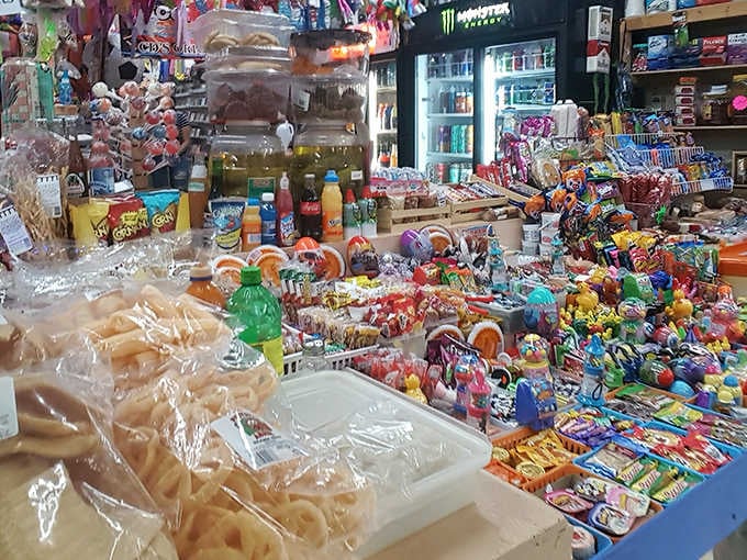 Snack paradise! This vendor's display would make Willy Wonka jealous &ndash; a kaleidoscope of treats where calories don't count if you're shopping.