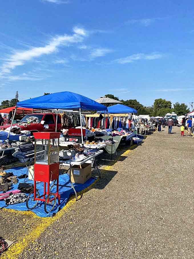 Under brilliant blue skies, the market comes alive with colorful canopies and tables laden with treasures waiting to be discovered.