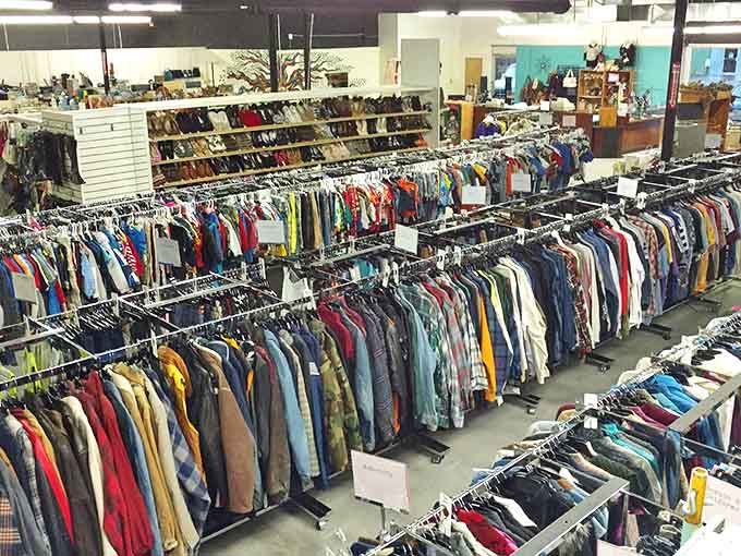 Clothing racks stretch to the horizon like a textile Grand Canyon. Every hanger holds a potential fashion revelation waiting to be discovered.