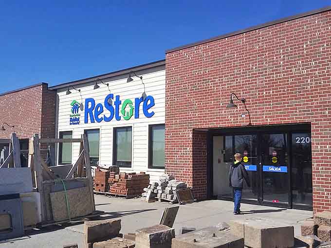 The unassuming brick exterior of ReStore hides a treasure trove within—like finding a speakeasy, but for home furnishings instead of cocktails.