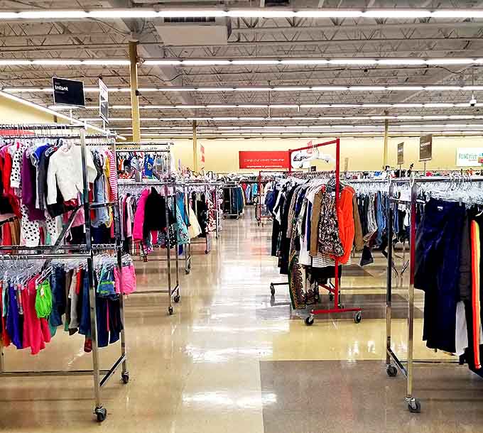 Endless racks of colorful clothing stretch toward the horizon, a treasure hunter's paradise where fashion finds await discovery.