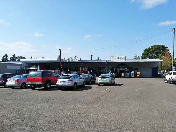 Parking lot packed with bargain hunters' vehicles &ndash; each car represents someone on a mission to find that perfect piece at a fraction of retail price.