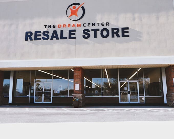 Like a beacon for budget-conscious shoppers, the Dream Center's sign practically whispers, "Yes, that designer lamp you've been eyeing? We have it cheaper."