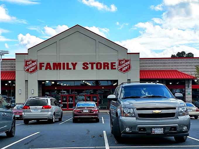 The Salvation Army Family Store in Manassas stands proud with its distinctive red trim, like a beacon calling bargain hunters to treasure-filled shores.