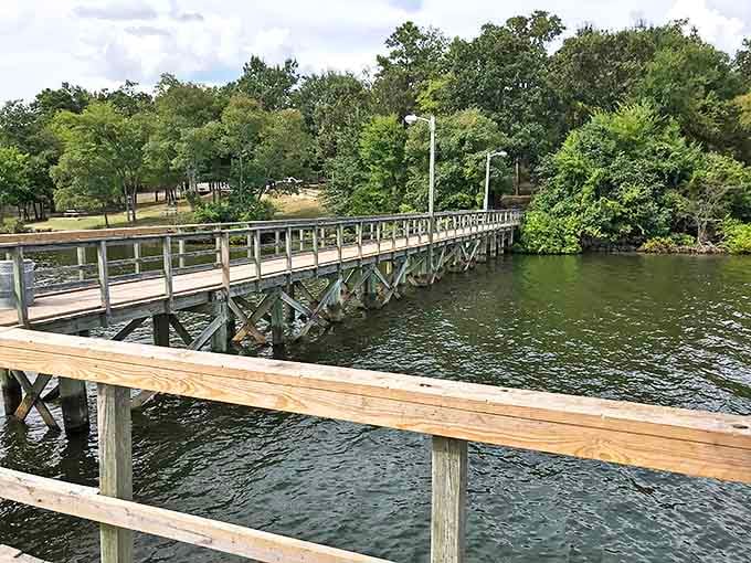 The fishing pier at Lake Bob Sandlin stretches into the water like an invitation, promising solitude and the whispered possibility of "the big one" just beneath the surface.