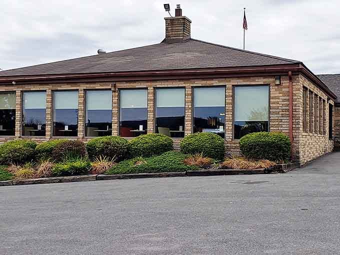 Rustic stone and large windows give this side view of Fry Bros a stately presence, like a countryside manor that happens to serve the best turkey for miles around.