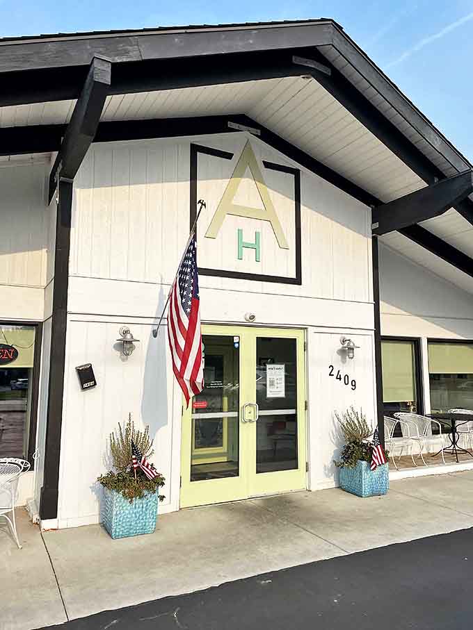 The charming white exterior of Anna's House beckons like a breakfast lighthouse, promising morning salvation for hungry souls adrift in Grand Rapids.