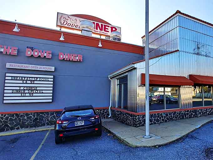 The Dove Diner's exterior promises what every hungry traveler seeks &ndash; a sanctuary where breakfast dreams come true and coffee flows like liquid optimism.