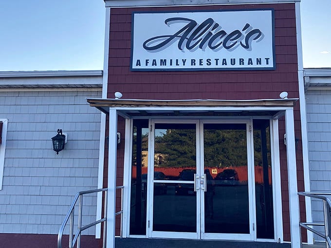 Alice's welcoming entrance beckons hungry travelers with the promise of home-cooked comfort, standing like a lighthouse for seafood pilgrims along Baltimore's culinary coast.