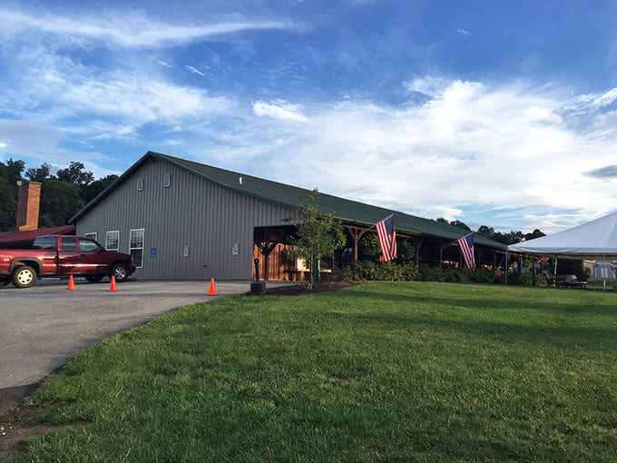 American flags flutter proudly outside this unassuming temple of comfort food, where the parking cones might as well say "Prepare your appetite here."