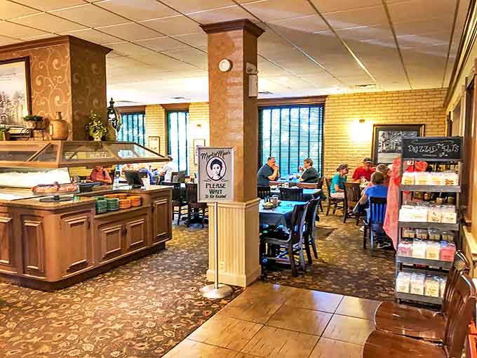 The cozy dining room at Myrtie Mae&rsquo;s hums with comfort food traditions. Shared tables and familiar faces make every meal feel unhurried.