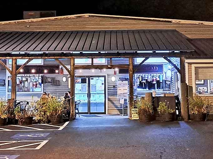 Evening lights welcome hungry visitors to this unassuming seafood haven, where Rhode Island's maritime bounty meets culinary magic.