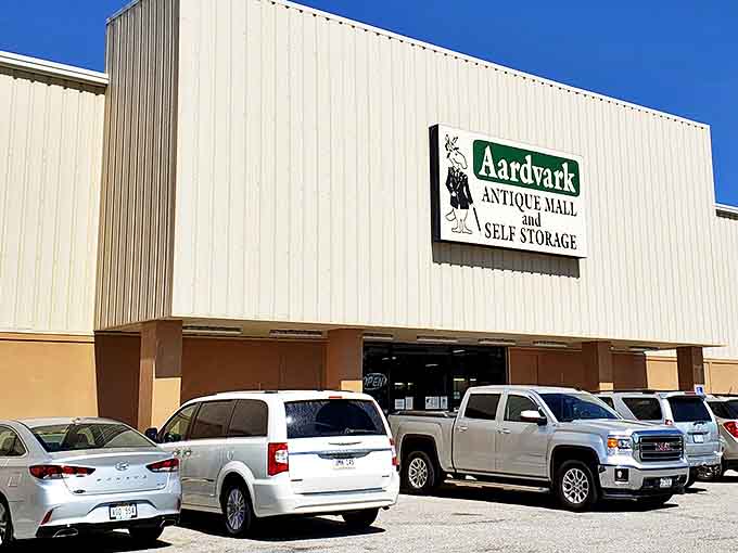 The distinctive green and white sign beckons vintage enthusiasts and casual browsers alike to this Lincoln landmark.