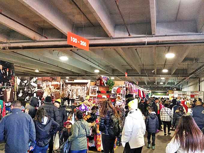 The indoor labyrinth of Buyer's Flea Market buzzes with treasure hunters navigating aisles where one person's castoffs become another's prized discoveries.